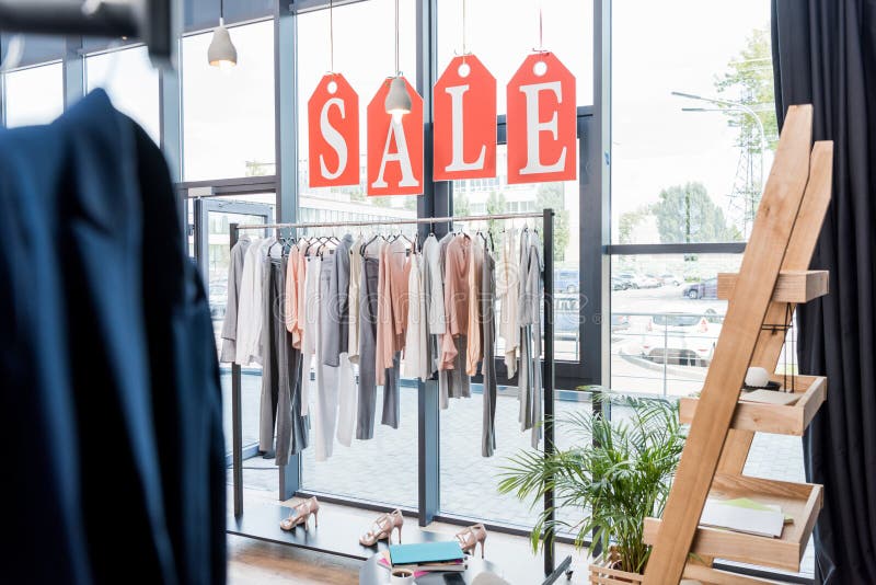 Rack with Hanging Clothes in Store Stock Image - Image of hangers ...