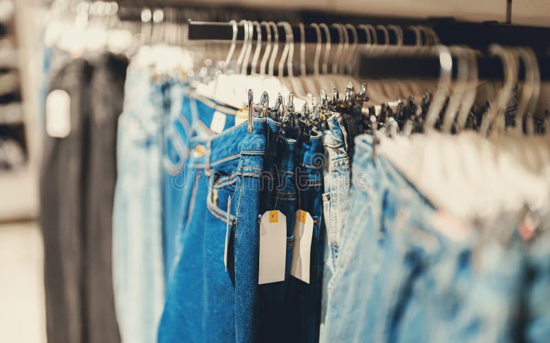 Rack with jeans stock image. Image of clothes, rack - 238067887
