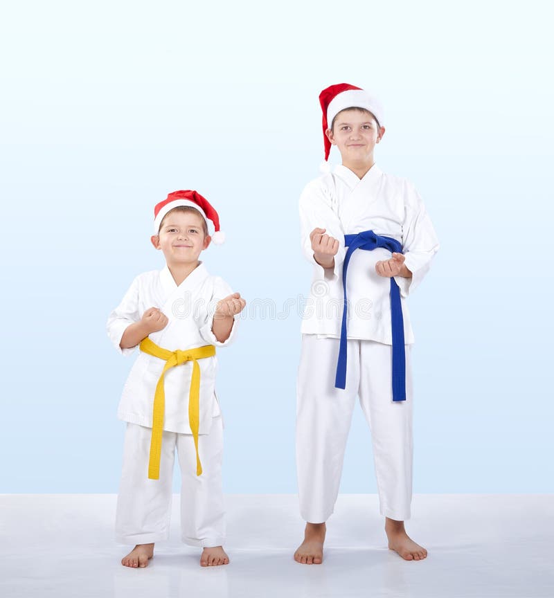 In Rack of Karate are Standing Athletes in Caps of Santa Claus Stock ...