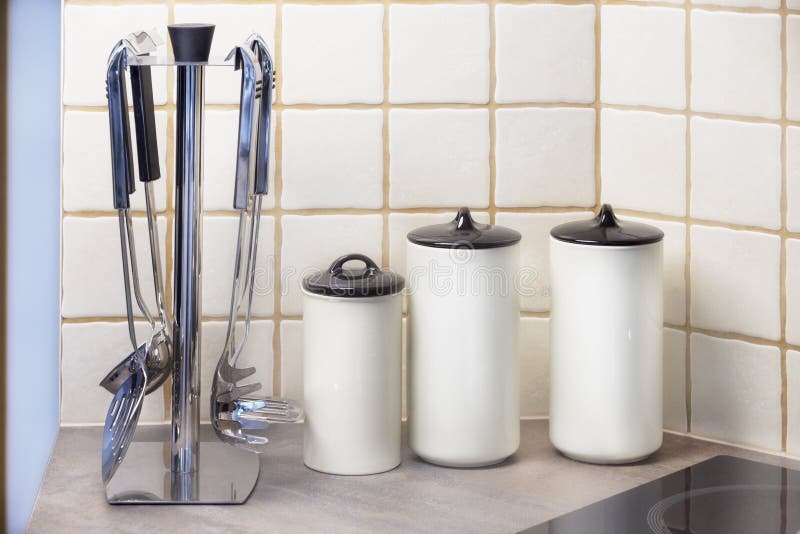 Rack of kitchen utensils stock image. Image of closeup - 70206689