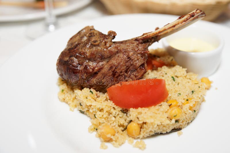 Rack of lamb with couscous stock image. Image of grilled - 19501263