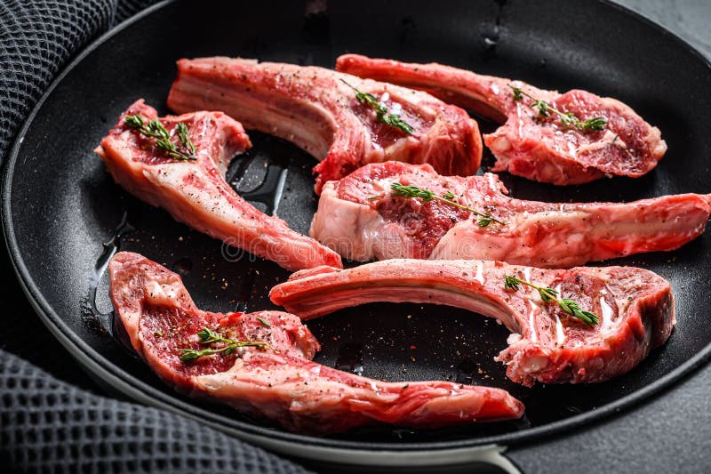 Rack of Lamb , Raw Meat with Bone. Organic Lamb Meat. Black Background ...