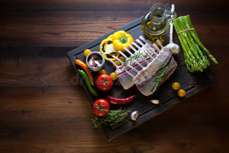 Rack of Lamb , Raw Meat with Bone on Rustic Kitchen Table at Wooden ...