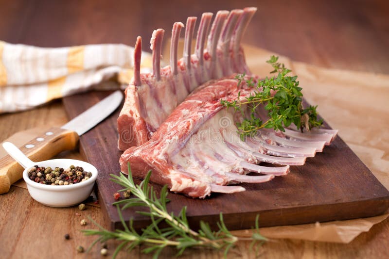 Rack of Lamb , Raw Meat with Bone on Rustic Kitchen Table at Wooden ...