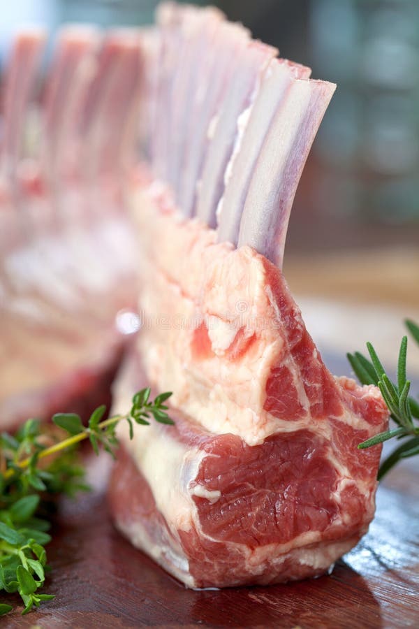 Rack of Lamb , Raw Meat with Bone on Rustic Kitchen Table at Wooden ...