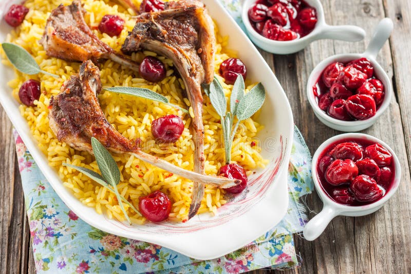 Rack of Lamb with Rice and Cherry Sauce Stock Photo - Image of cuisine ...
