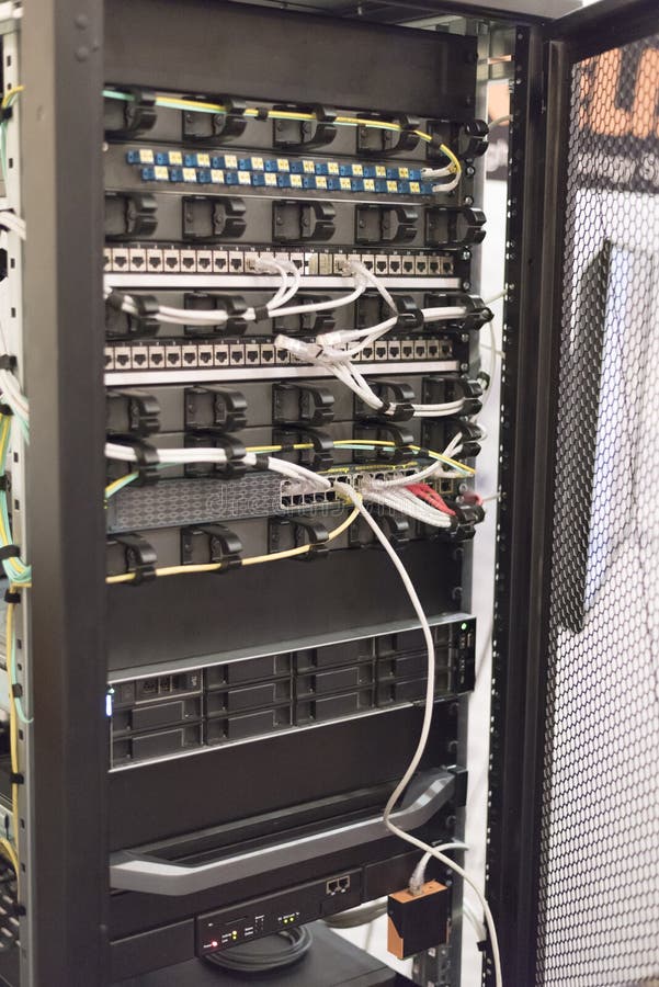 Rack Mounted Servers in a Server Room, Man Work with Lan or Network ...