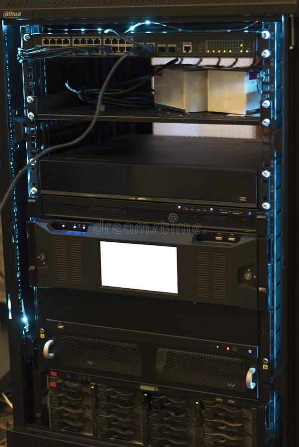 Rack Mounted Servers in a Server Room, Man Work with Lan or Network ...