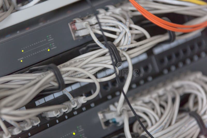 Rack Mounted Servers in a Server Room, Man Work with Lan or Network ...