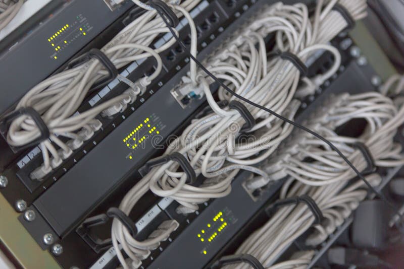 Rack Mounted Servers in a Server Room, Man Work with Lan or Network ...