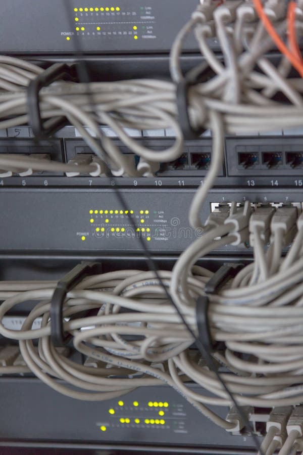 Rack Mounted Servers in a Server Room, Man Work with Lan or Network ...