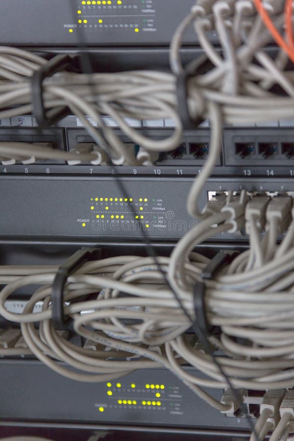 Rack Mounted Servers in a Server Room, Man Work with Lan or Network ...