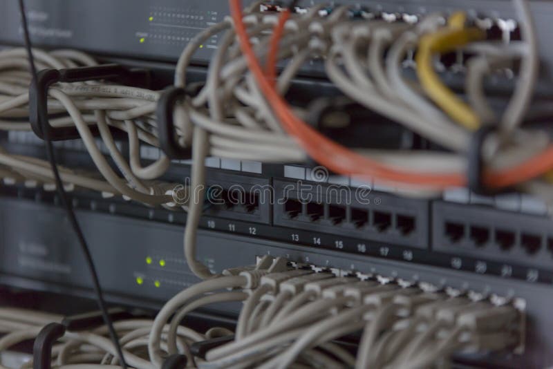 Rack Mounted Servers in a Server Room, Man Work with Lan or Network ...