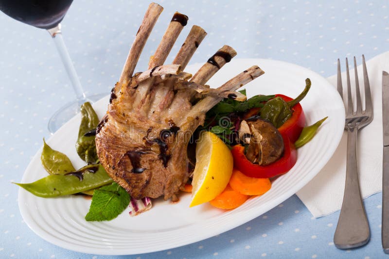 Roasted Rectangle Lamb Rack Stock Photo - Image of lamb, champignons ...