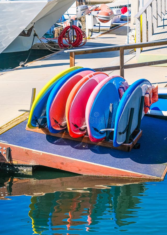 Rack of Paddleboards stock photo. Image of travel, assortment - 166613834