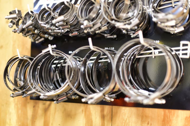 A rack of pipe clamps stock photo. Image of hanging - 250376556