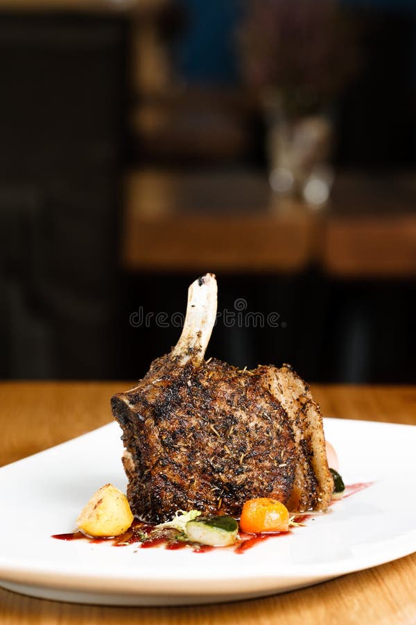 Rack of Pork Grilled with Garnish Stock Image - Image of flame, dinner ...