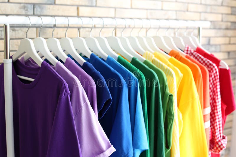 Rack with rainbow clothes stock image. Image of clothes - 118896323