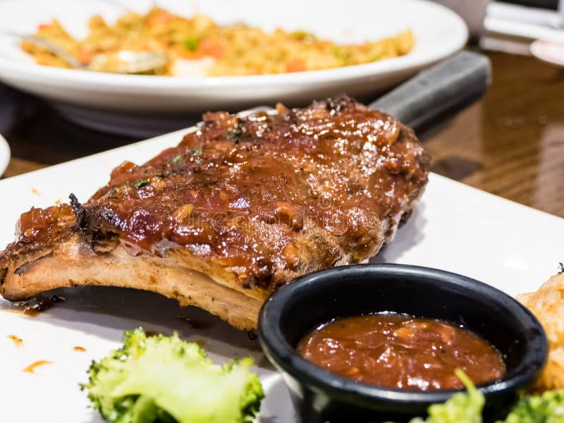Rack of ribs on plate stock image. Image of barbeque - 103267343