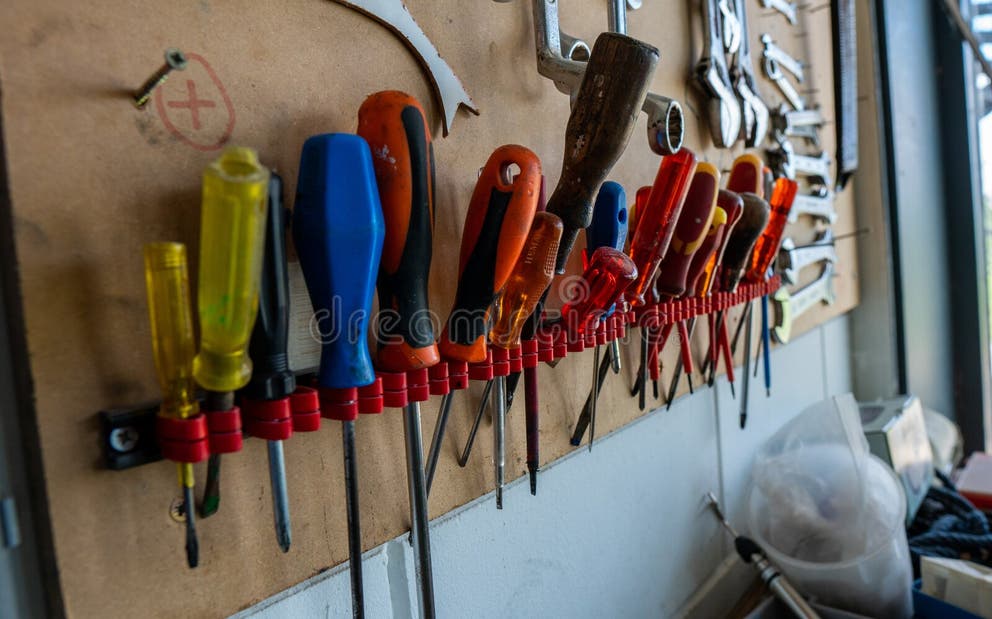 Rack of Drivers on a Messy Workbench Stock Image - Image of hardware ...