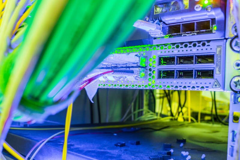 Rack with Server Equipment of Internet Provider. Many Cables Converge ...