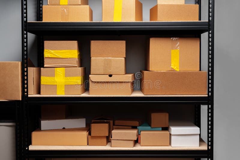 Rack Shelves with Paper Boxes in Warehouse. Stock Photo - Image of ...