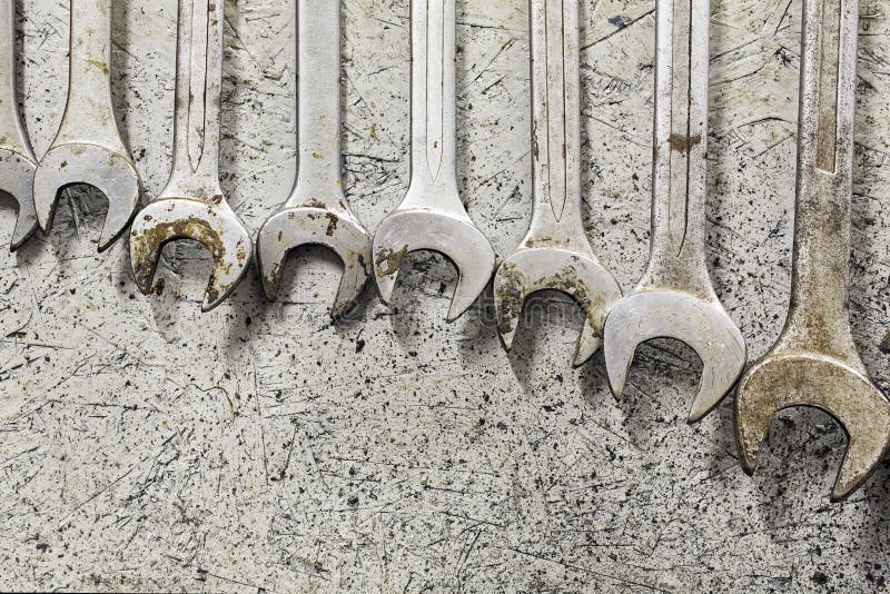 Rack of Spanners Hanging on a Wall Over a Workbench Stock Photo - Image ...