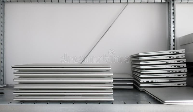 Rack with a Stack of Laptops in the Storage Room Stock Image - Image of ...