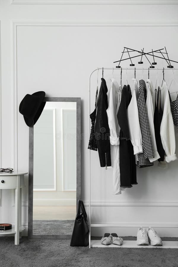 Rack with Stylish Clothes in Modern Dressing Room Stock Photo - Image ...