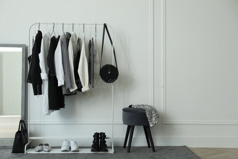 Rack with Stylish Clothes in Modern Dressing Room Stock Image - Image ...