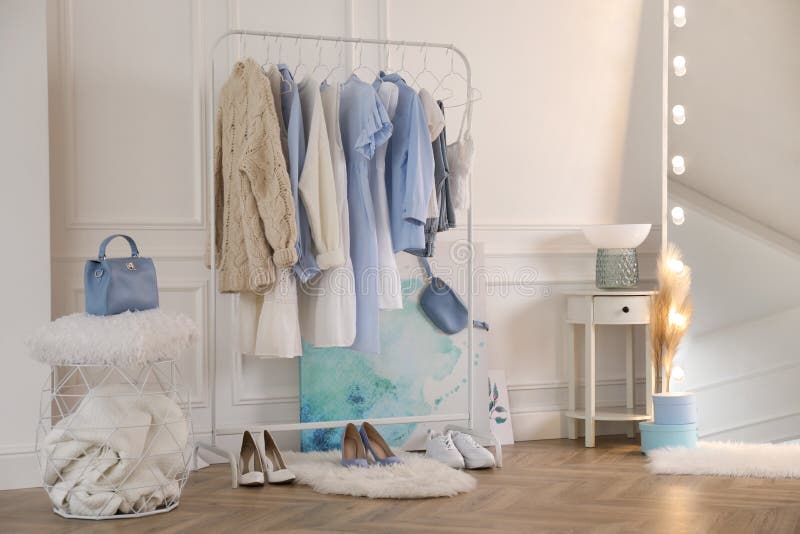 Rack with Stylish Clothes in Modern Dressing Room Stock Photo - Image ...
