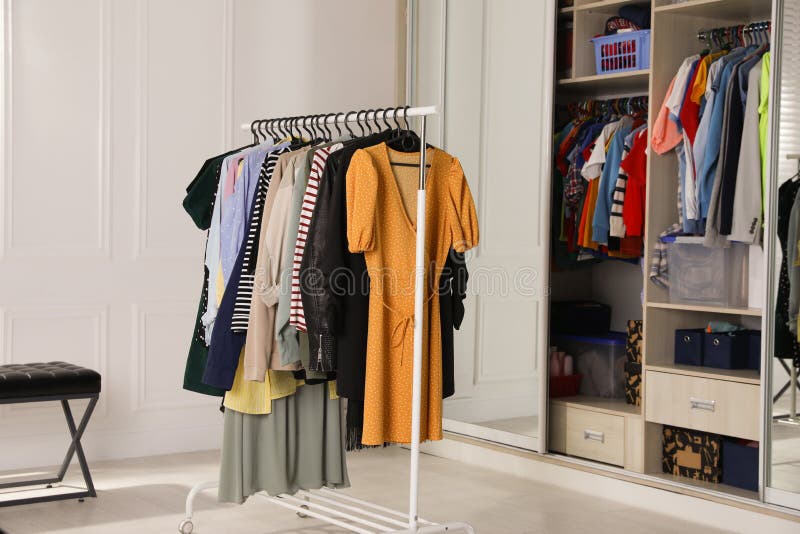 Rack with Stylish Women`s Clothes in Dressing Room Stock Image - Image ...