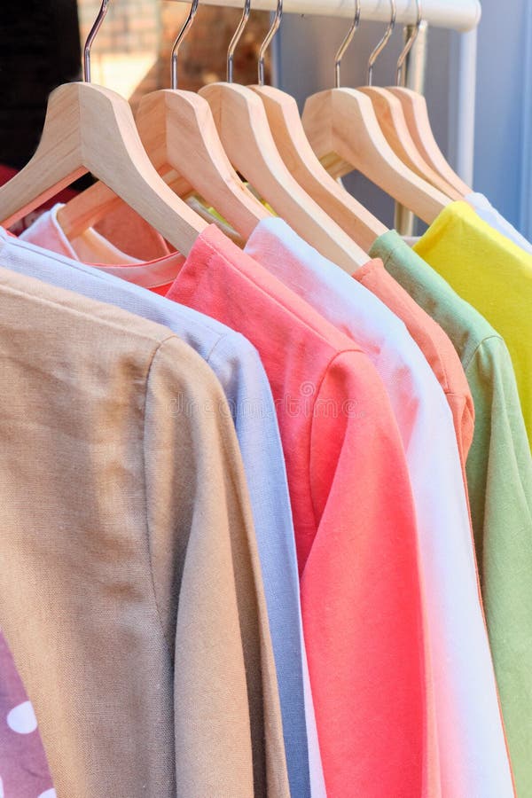 Rack with Summer Colored Clothes on Hangers Stock Image - Image of ...