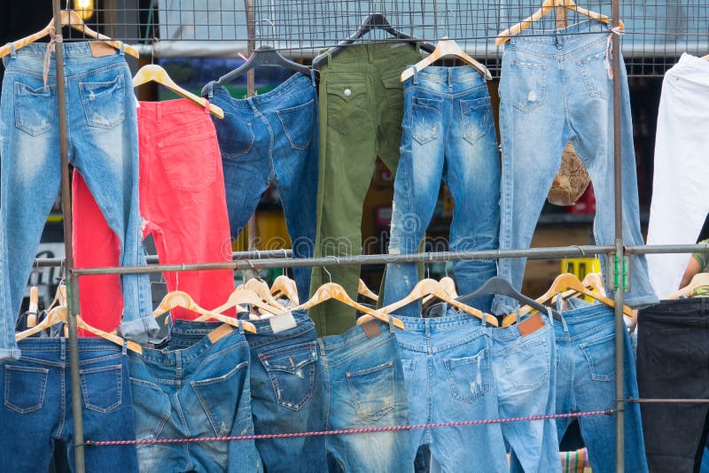 A Rack of a Variety of Blue Jean in Market Stock Image - Image of jean ...