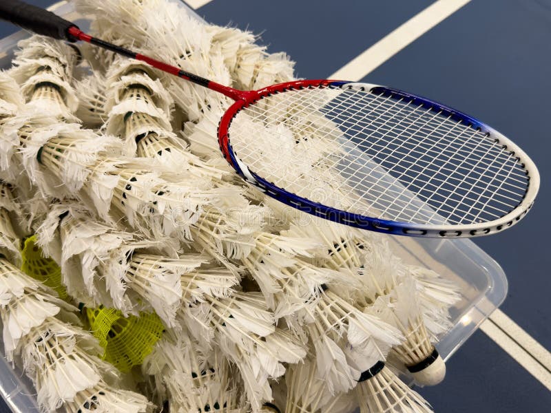 Racket and Shuttlecock with Use Sport or Exercise on a Black Background ...