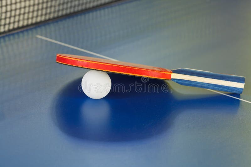 Racket, Tennis Ball on Blue Ping Pong Table Stock Image - Image of ...