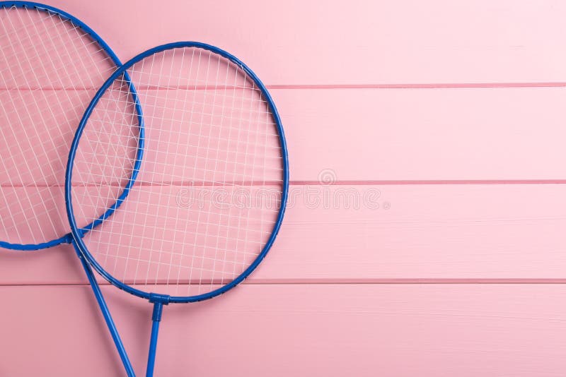 Rackets on Pink Wooden Table Flat Lay with Space for Text. Badminton ...