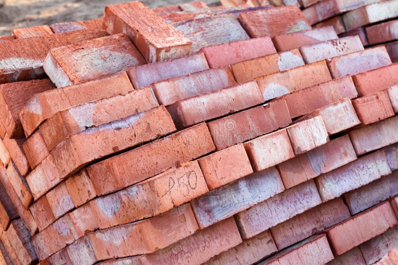 Racks with Brick. Masonry, Stonework. Several Pallets with Concrete ...