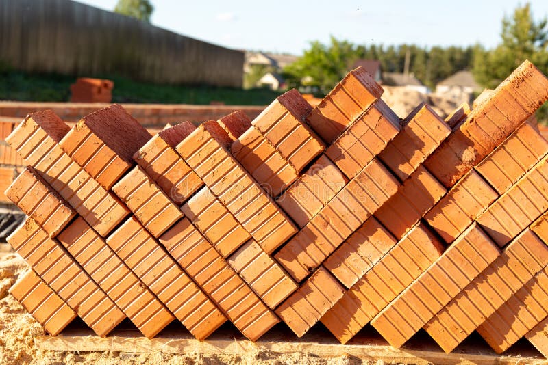 Racks with Brick. Masonry, Stonework. Several Pallets with Concrete ...