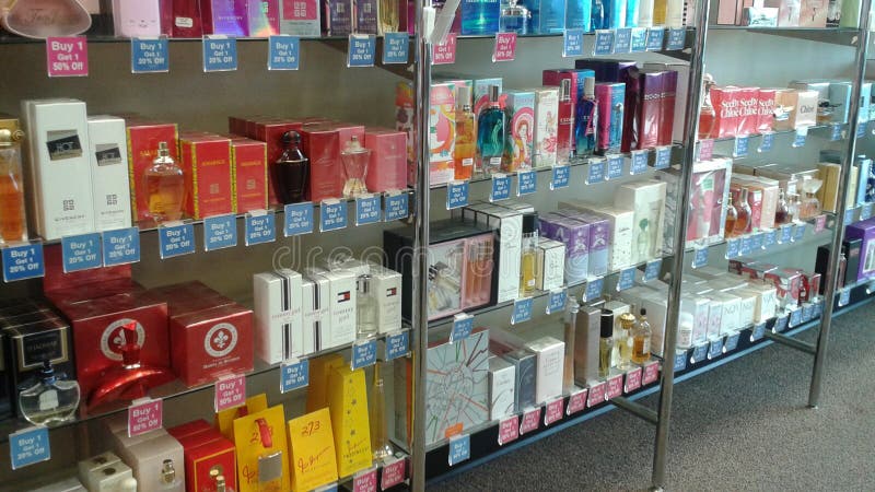 Racks of perfume editorial stock image. Image of boxes - 42499499