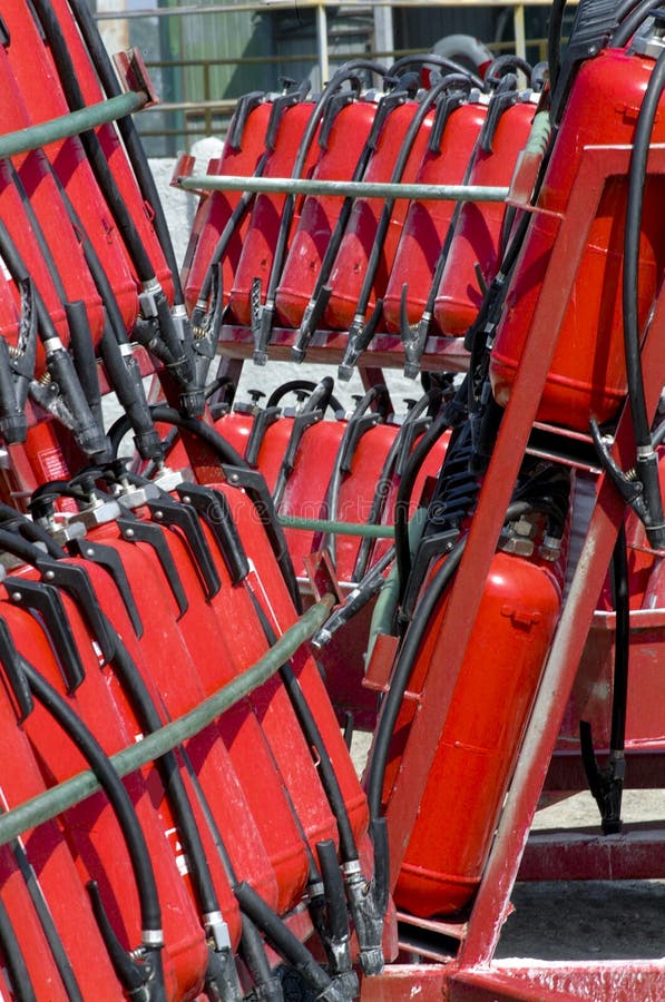 Racks of Fire Extinguishers, Firefighter Equipment Stock Image - Image ...
