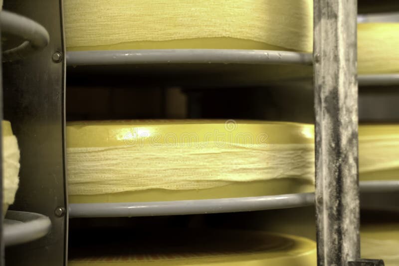 Racks with Washers of Cheese. Cheese Stock Photo - Image of fermenting ...