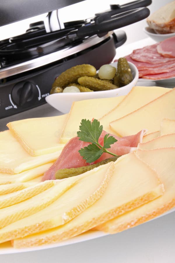 Plate of raclette cheese stock photo. Image of gastronomy - 18705300
