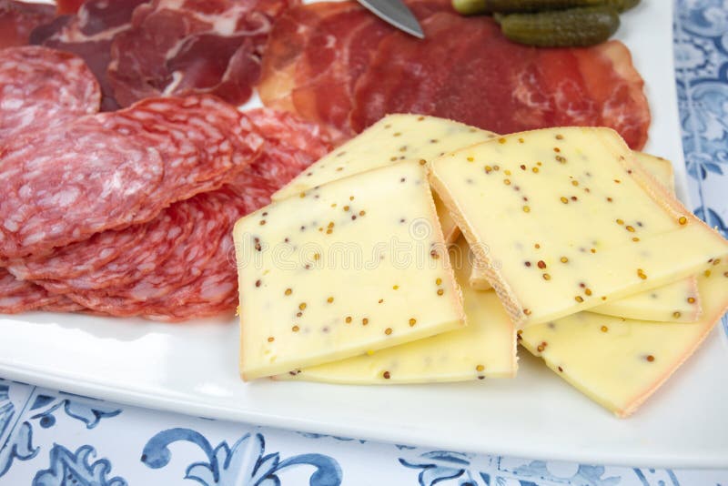 Raclette Cheese and Cold Cuts on a Table Stock Image - Image of france ...