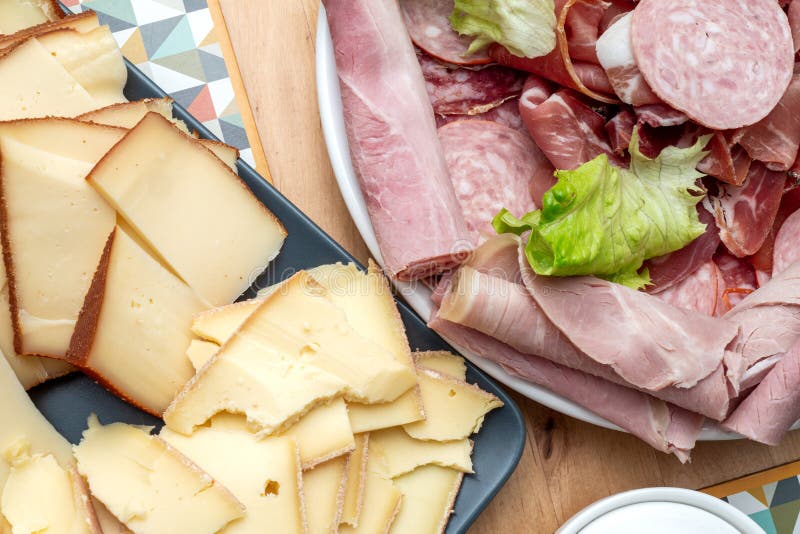 Raclette Cheese and Meat, French Tradition Stock Image - Image of ...