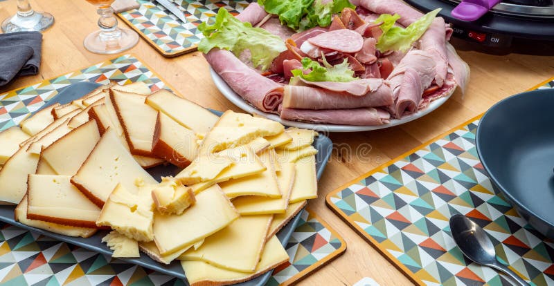 Raclette Cheese and Meat, French Tradition Stock Photo - Image of ...