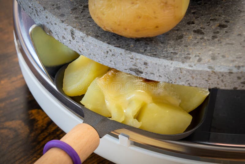 Raclette Cheese Melting in a Pan Stock Image - Image of raclette ...