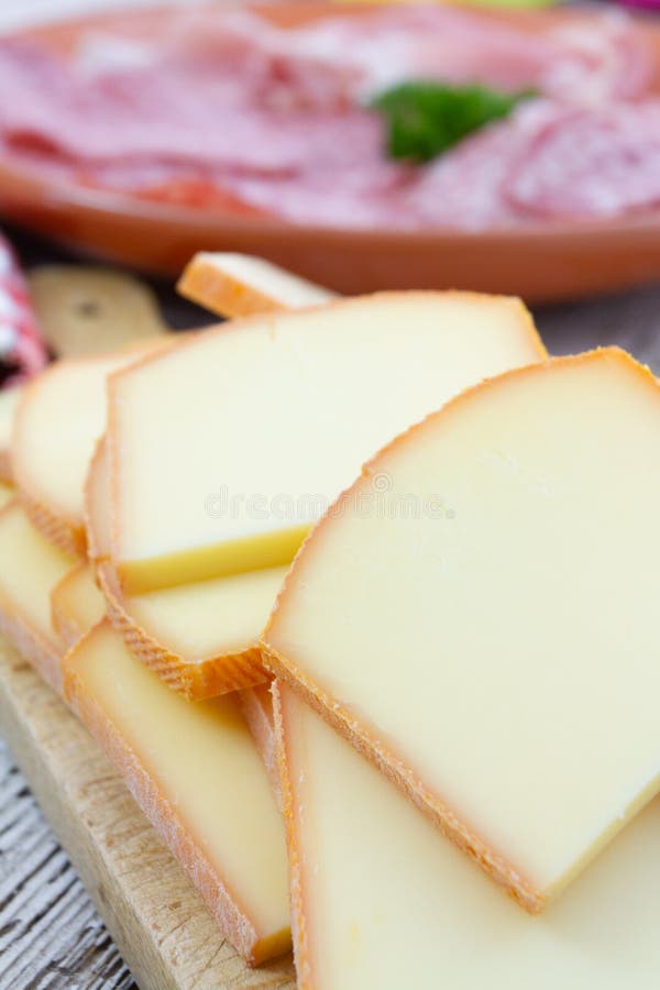 Raclette cheese stock image. Image of swiss, raclette - 125504089