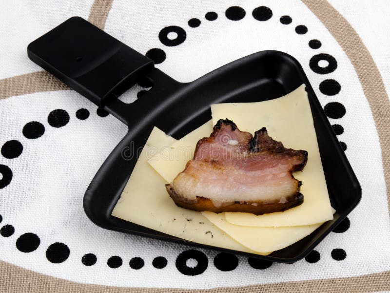Raclette Pan with Cheese and Bacon - Party Food Stock Image - Image of ...