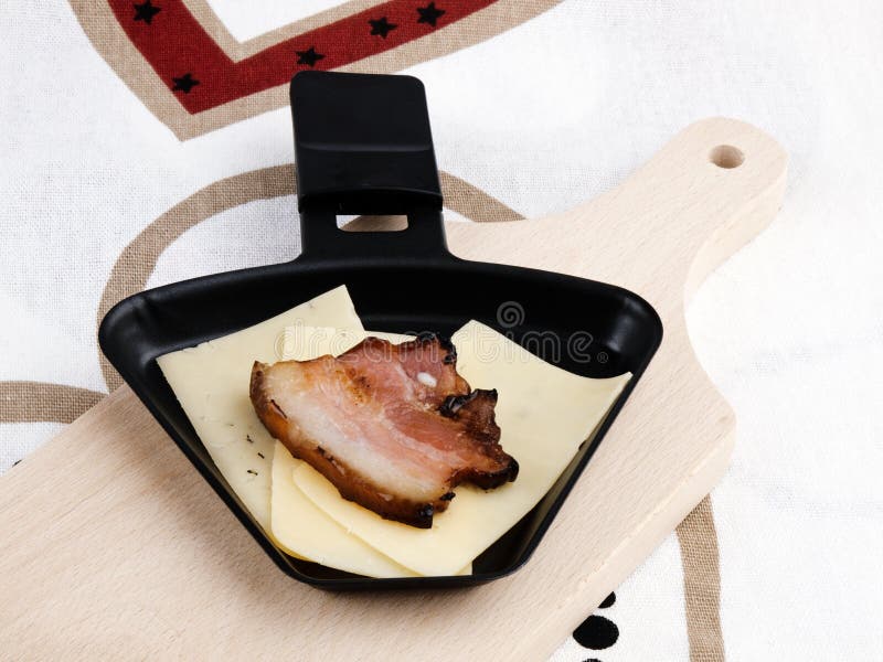 Raclette Pan with Cheese and Bacon - Party Food Stock Image - Image of ...